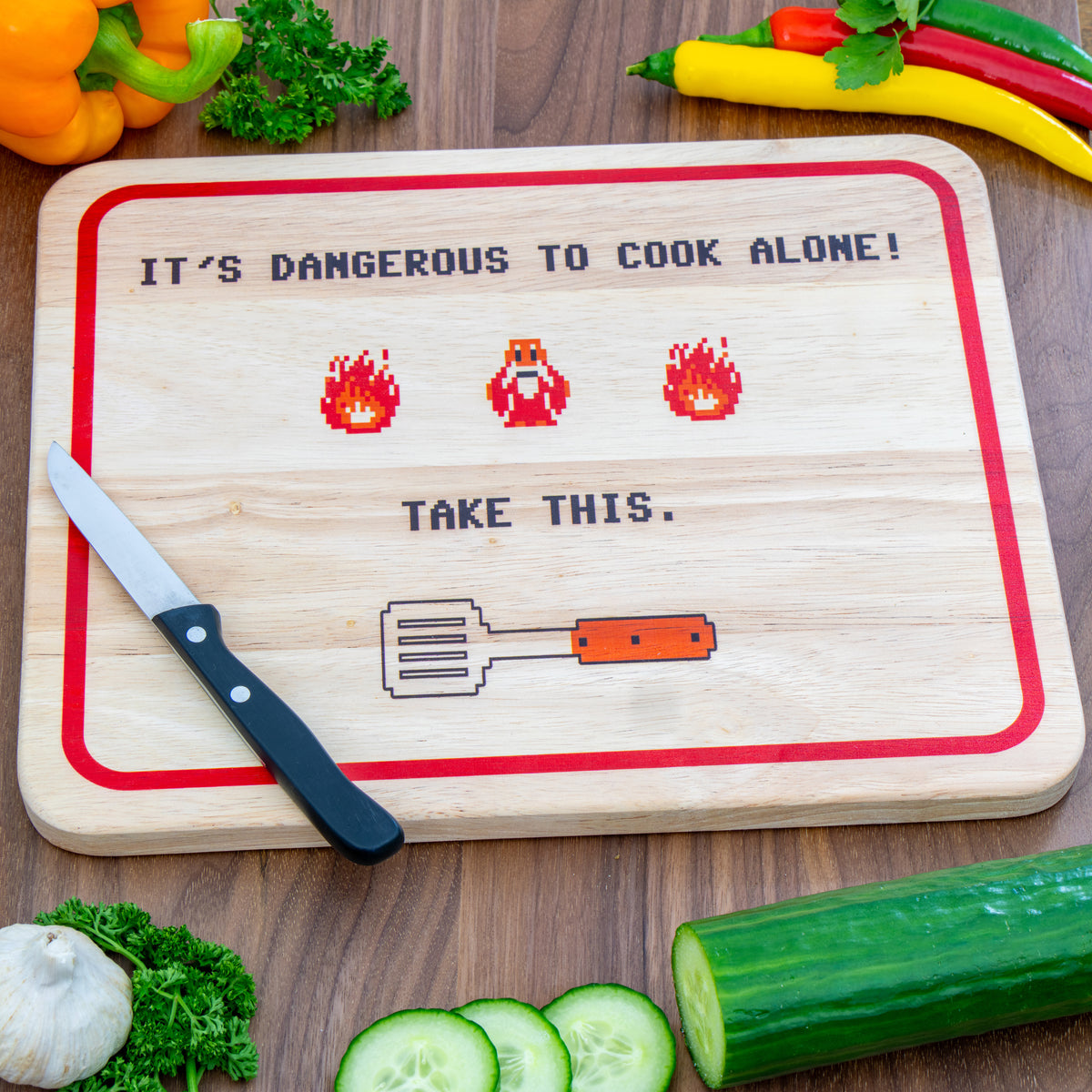 Cutting board Dangerous to cook alone — getDigital